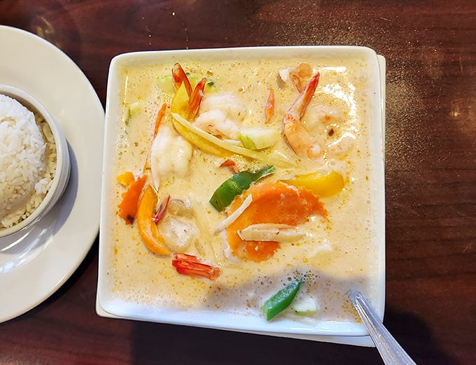 This coconut curry is like a warm hug from Thailand—vibrant vegetables swimming in a silky broth that's both comforting and exciting.