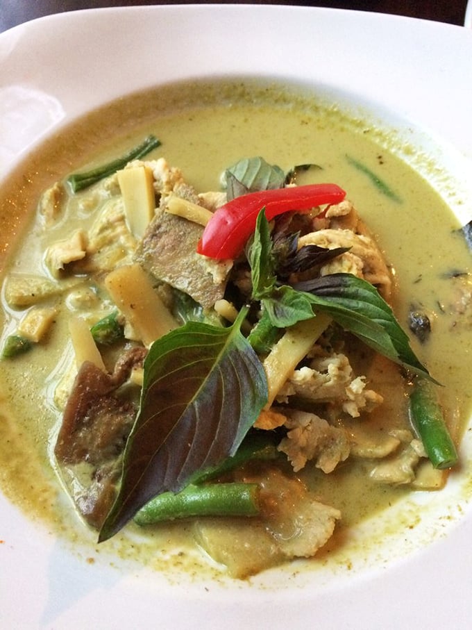 This green curry doesn't just bring the heat—it brings a complex symphony of flavors that'll make you forget your name momentarily.