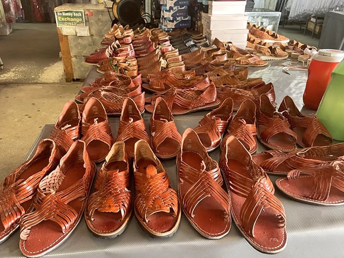 Handcrafted leather sandals lined up like soldiers ready for summer duty – each pair telling stories of craftsmanship that big-box stores simply can't match.