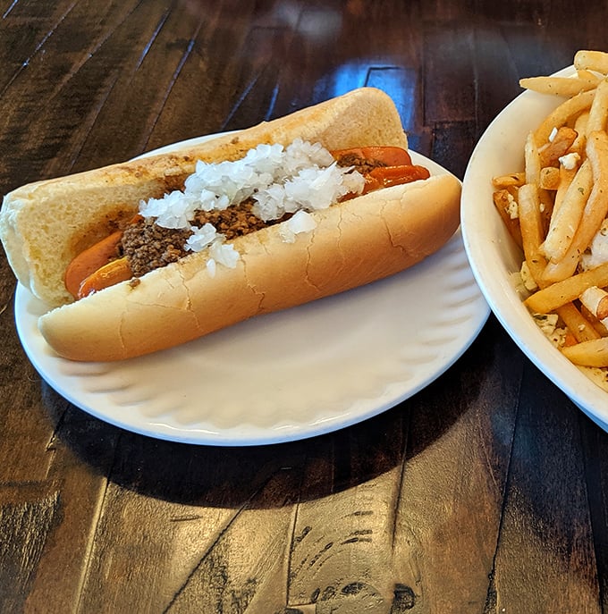 Sometimes the simplest pleasures are the most profound – a perfectly dressed hot dog with just the right snap, proving Harry's hasn't forgotten its roots.