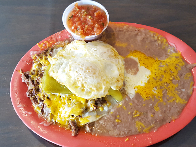Huevos Rancheros that doesn't just wake you up—it gives you a full-throated, mariachi-backed good morning that'll fuel your mountain adventures for hours.
