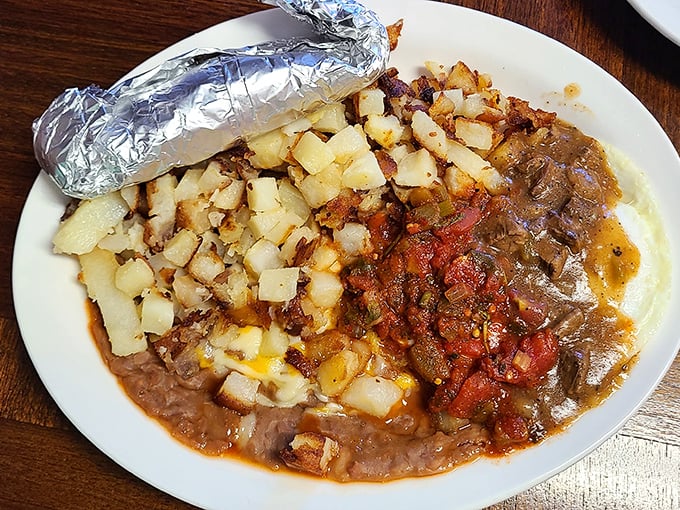 Huevos Rancheros: where potatoes, beans, and salsa come together like the world's most delicious Venn diagram of breakfast perfection.