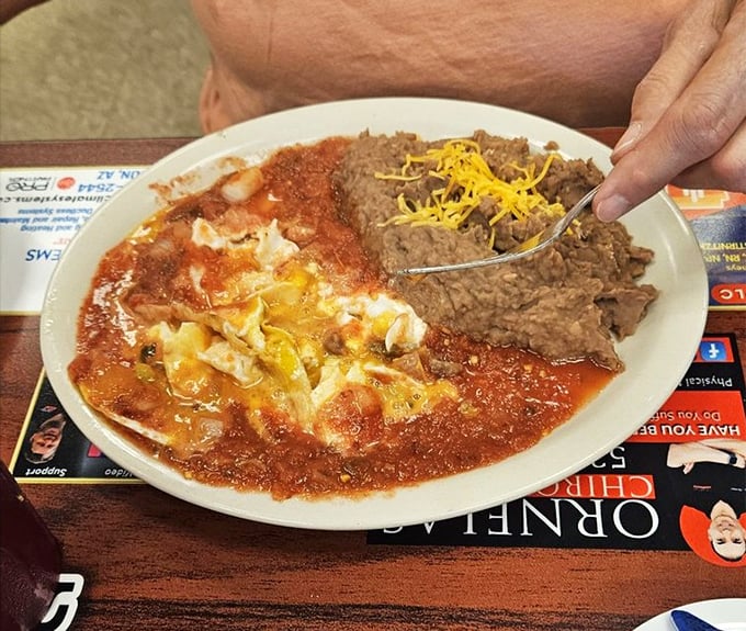 Huevos rancheros that deliver a fiesta of flavors. The perfect marriage of eggs, sauce, and beans – like a Southwestern symphony on a plate.
