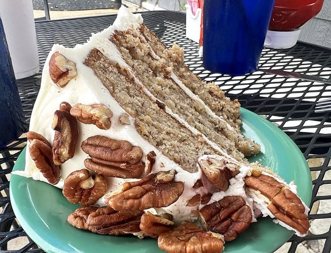 This isn't just cake—it's an architectural masterpiece of moist layers, cream cheese frosting, and pecans that would make your grandmother simultaneously proud and jealous. 