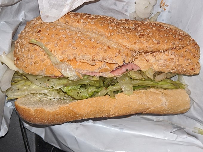 This isn't just a hoagie – it's an architectural marvel of Italian meats, crisp vegetables, and sesame-studded bread that demands respect.