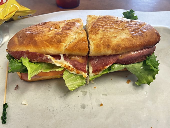 This Italian sub isn't just a sandwich, it's architecture – a carefully constructed masterpiece of meat, cheese, and fresh veggies on perfectly toasted bread.