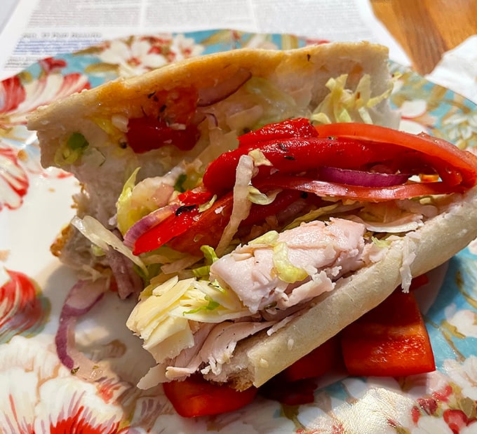The Italian hoagie in its natural habitat—wrapped in paper, layered with precision, and ready to make your taste buds dance the tarantella.