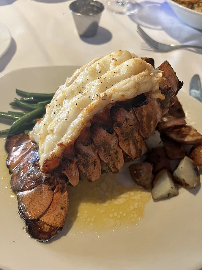 Lobster tail that makes you question why you ever settled for chicken. Perfectly split, expertly broiled, and ready for its butter bath.