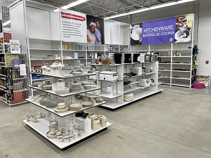 Plates, bowls, and kitchen gadgets stand at attention, like culinary soldiers ready to march into new homes and create fresh memories.