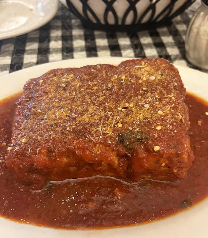 This lasagna isn't just a meal, it's an architectural achievement—layers of pasta, sauce, and cheese creating the Sistine Chapel of comfort food.