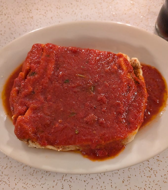 This lasagna isn't just a meal—it's a warm embrace in food form. The sauce blankets each layer like a cozy Italian sweater on a chilly Cleveland evening.