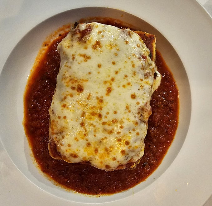 This isn't just lasagna; it's a geological event – layers of pasta, cheese, and sauce that would make any nonna weep with pride.