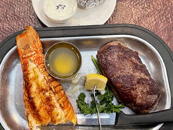 Surf and turf: where land meets sea in perfect harmony. That butter-drenched lobster tail isn't just food—it's a special occasion on a plate.