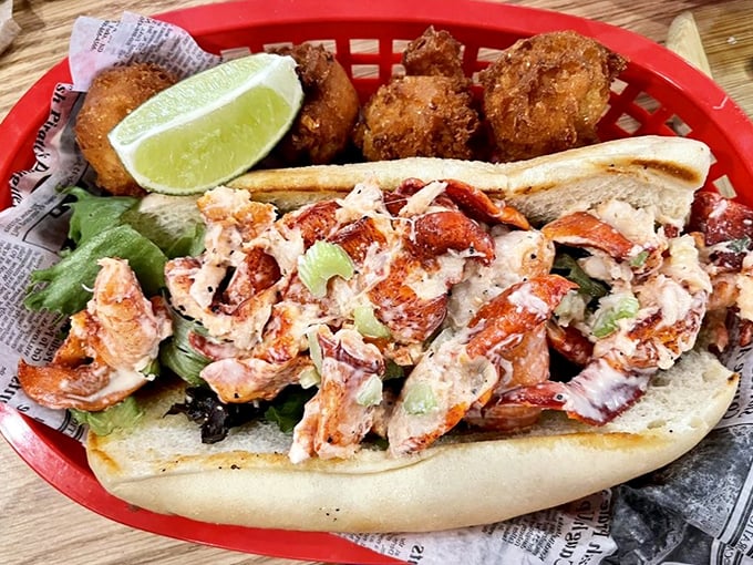 Not all heroes wear capes—some come in soft rolls packed with lobster meat. This sandwich has more chunks than a chocolate factory.