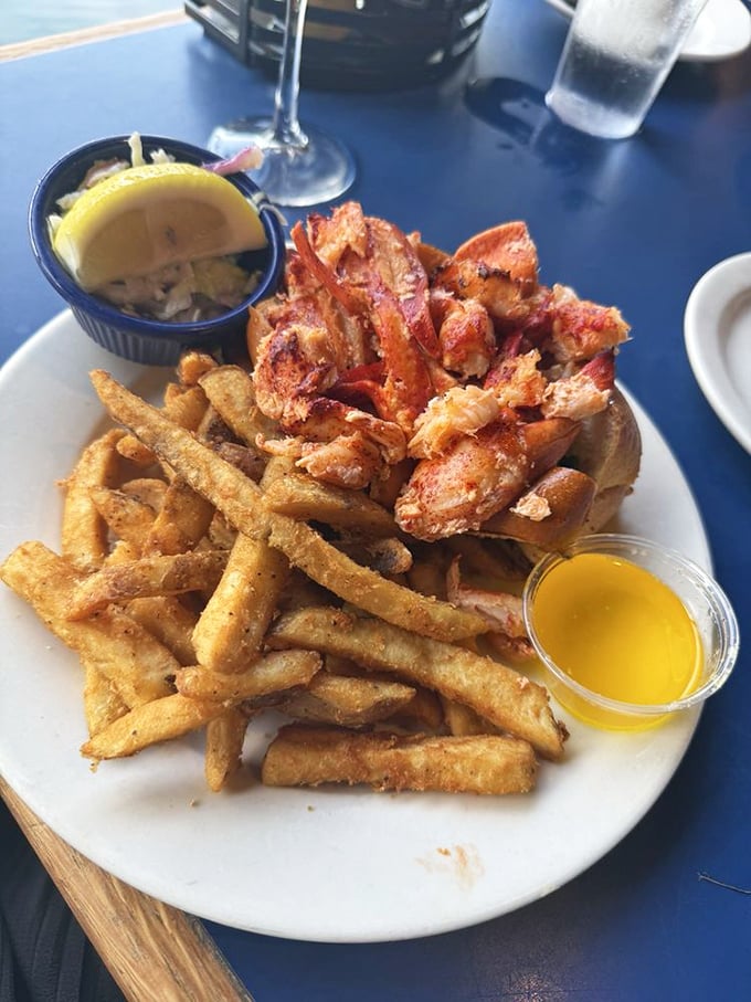 Lobster and fries—the beach vacation romance that never ends. Golden fries playing wingman to sweet, succulent lobster meat.