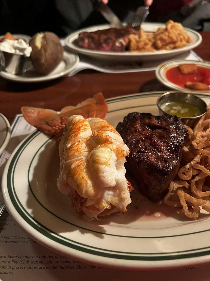 Surf and turf: where land meets sea in perfect harmony. This lobster tail looks ready to swim right into your heart (and stomach).