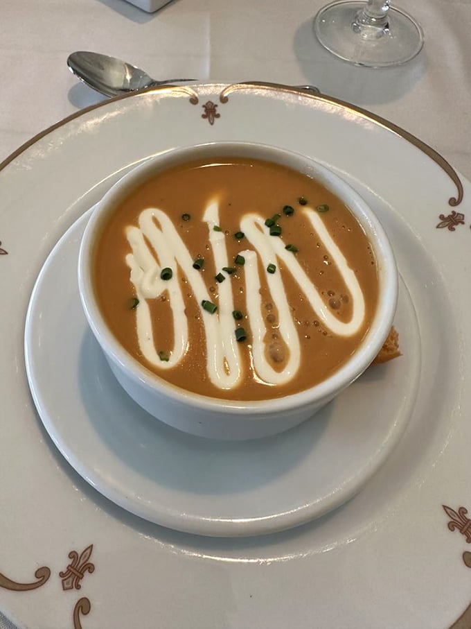 This isn't just soup—it's lobster bisque elevated to an art form, with a creamy swirl and delicate garnish that makes each spoonful a luxurious experience.