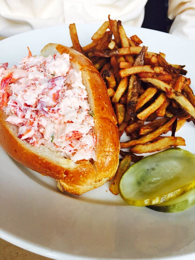 The lobster roll—where sweet, tender meat meets buttery roll in a romance more perfect than any Hollywood ending.