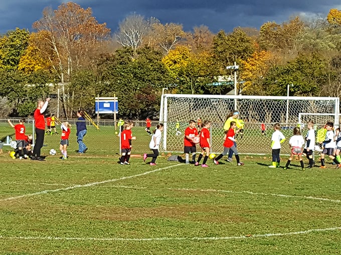 Saturday soccer in Lewistown—where kids learn teamwork, parents cheer wildly, and nobody's checking real estate apps during halftime.