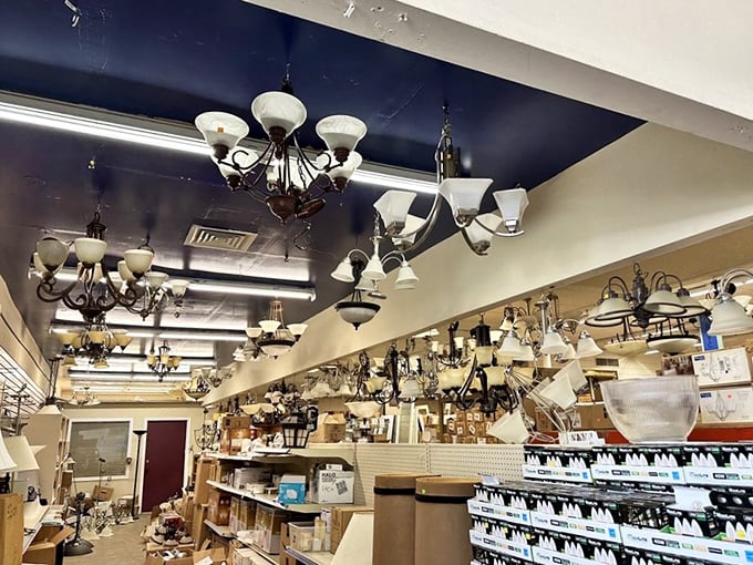 The chandelier section glows with potential—yesterday's dining room statement pieces waiting for their second act in your home renovation story.