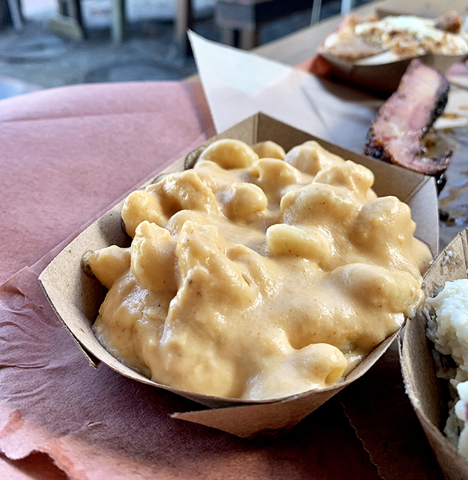 Mac and cheese that doesn't know it's a side dish – this creamy, golden masterpiece demands equal billing with the meats.