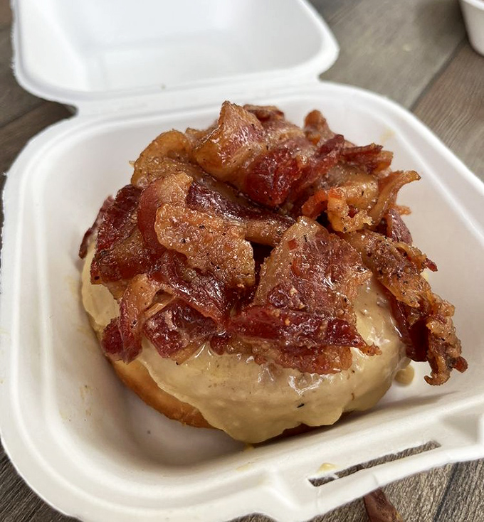 The maple bacon donut – where breakfast's greatest hits collaborate on one perfect stage. Sweet meets savory in perfect harmony.