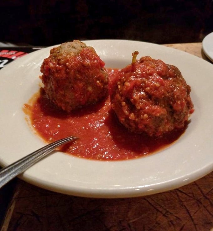 These meatballs aren't just food; they're edible history – the kind your Italian grandmother would approve of between kisses on your cheek.