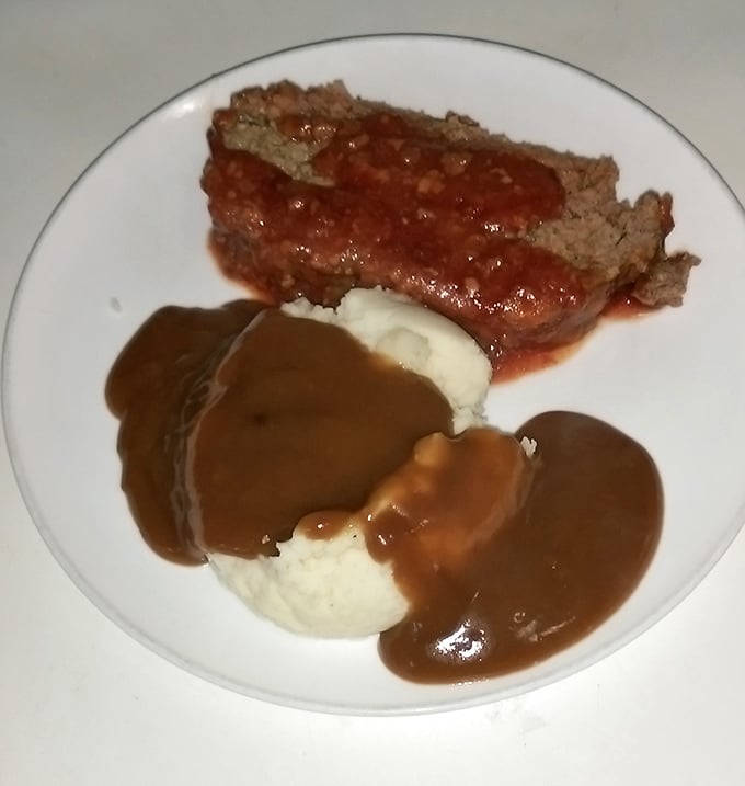 Meatloaf and mashed potatoes—the dinner that launched a thousand childhood memories, smothered in gravy that could make a grown adult weep with joy.