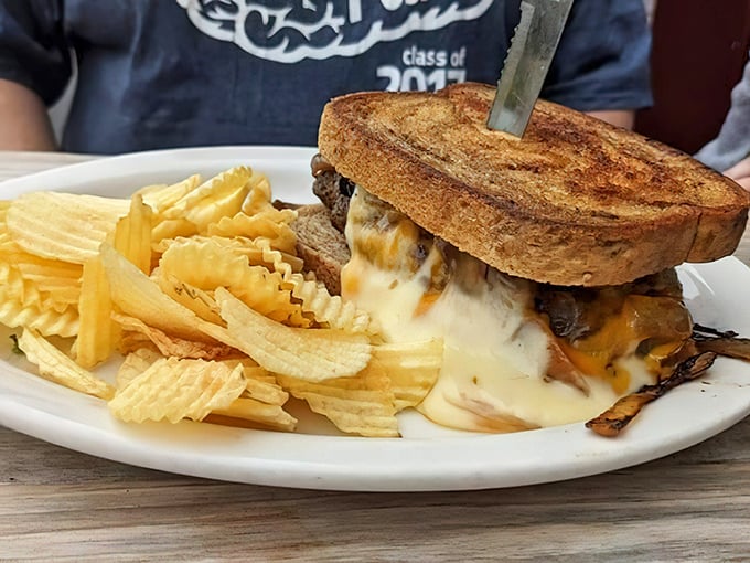 This melt isn't just oozing cheese—it's practically performing a slow dance of dairy decadence. The kind of sandwich that demands both hands and zero interruptions.