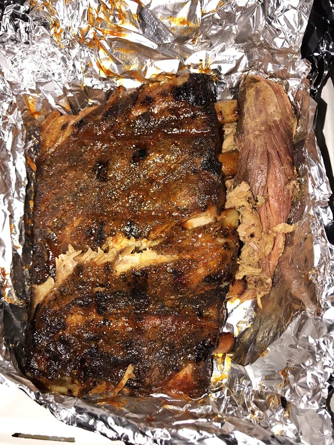 Memphis ribs that don't just fall off the bone – they practically leap into your mouth with smoky enthusiasm.