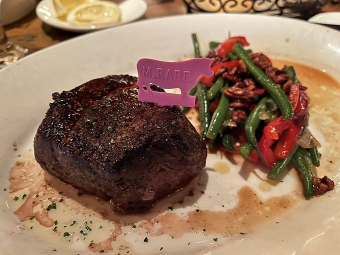 That little pink flag isn't just cute—it's a declaration that this filet mignon has achieved rare perfection.