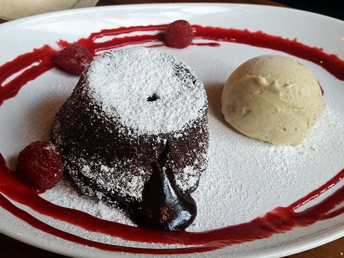 The molten chocolate cake breaks open like a delicious volcano, with vanilla ice cream playing the cool companion to all that warm, gooey intensity.
