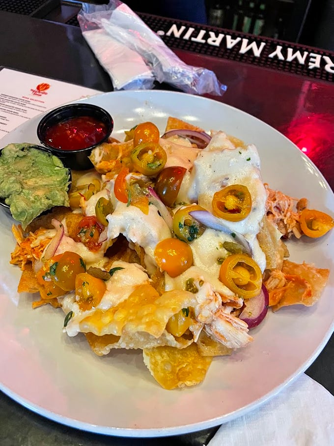 Nachos that could feed a zombie horde. The colorful jalapeños and melty cheese create a flavor explosion that's anything but scary—unless you're counting calories.