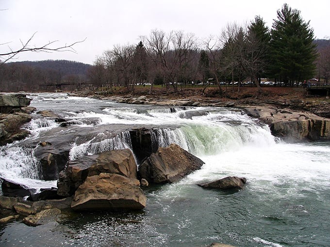 Winter's retreat reveals Ohiopyle Falls in full spring glory, where the Youghiogheny River performs its perpetual magic trick of turning gravity into art.