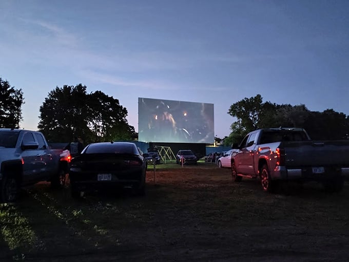Dawn reveals the sleeping giant—a blank screen waiting patiently for sunset to bring it roaring back to life.