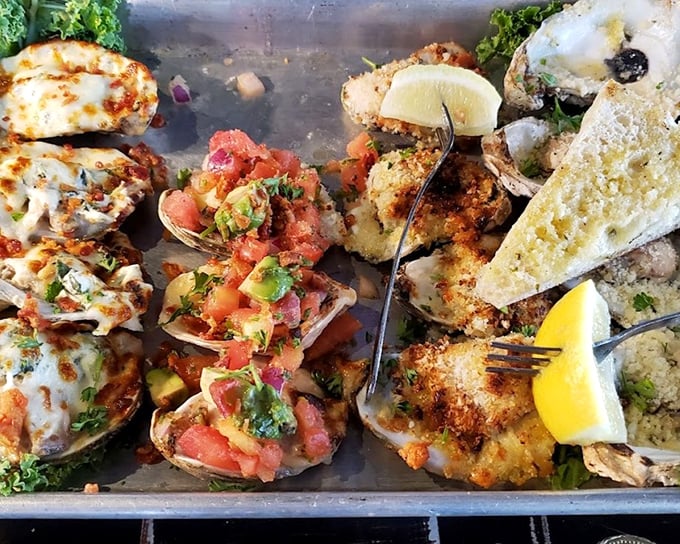 The oyster flight arrives like a seafood jewelry box—each bivalve dressed differently but equally ready for their grand entrance into your culinary memories.