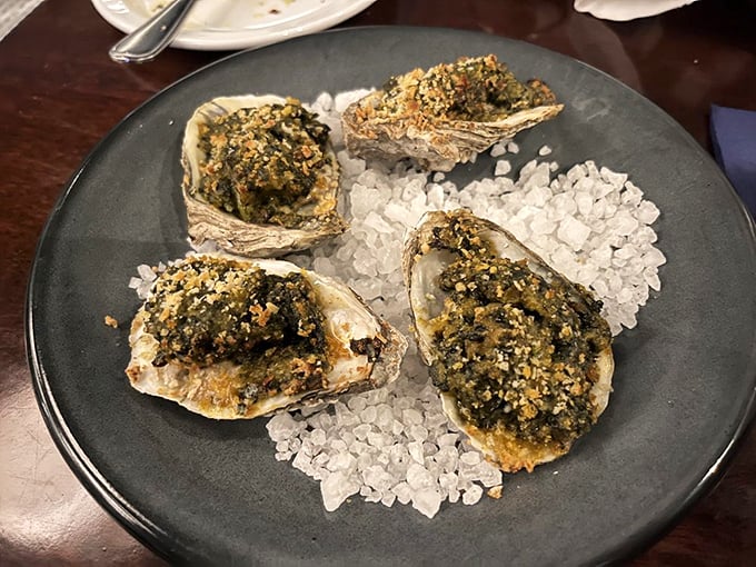 These Oysters Rockefeller aren't just baked – they're transformed into little jewels of the sea, nestled on a bed of rock salt.
