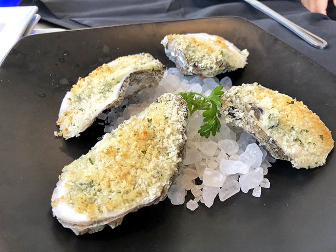 Oysters Rockefeller that would make the Vanderbilts jealous, perched on ice like jewels in a crown. Decadence has never been so briny-good.