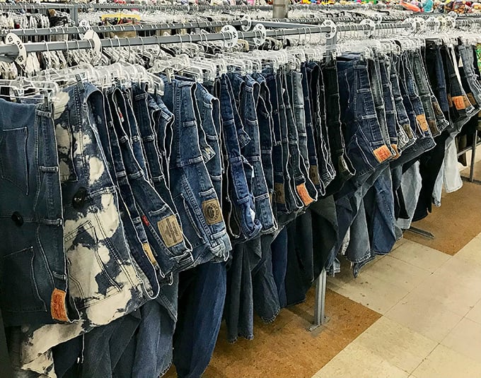 The denim section rivals the Texas sky in its vastness. Each pair tells a story—some with more character development than others.