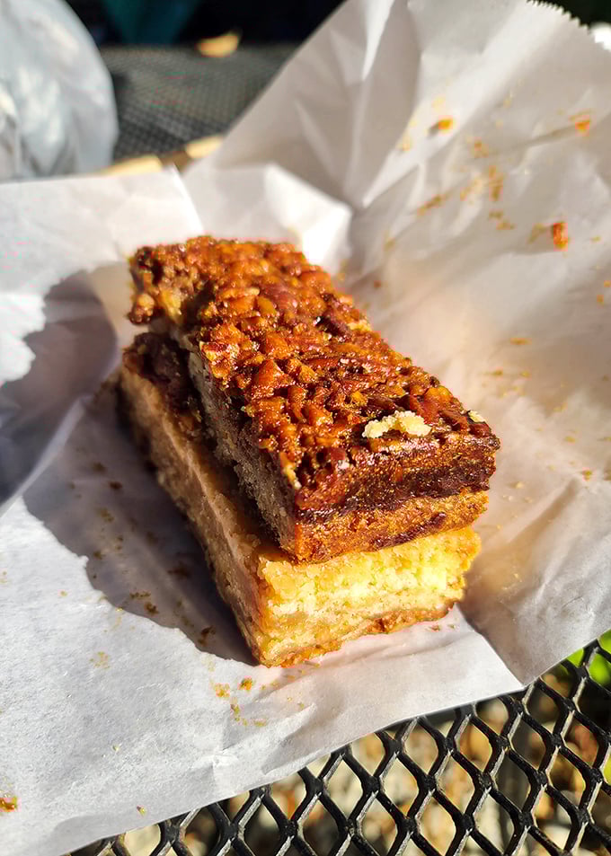 Layer upon layer of buttery pecan goodness – this isn't just a dessert bar, it's architecture you can eat.