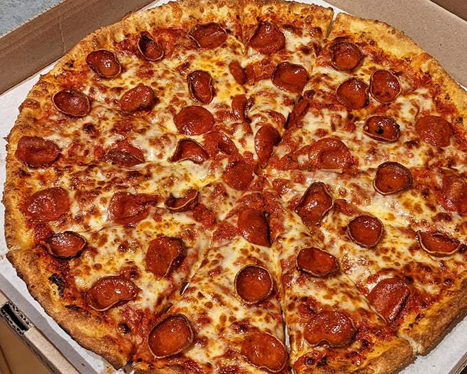 This pepperoni pizza doesn't just have toppings – it has a constellation of perfectly crisped pepperoni discs creating a meaty Milky Way.