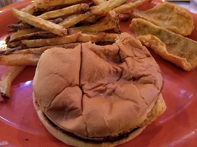 This perch sandwich doesn't need fancy frills – just a soft bun, perfectly fried fish, and fries that make you forget counting calories was ever invented.