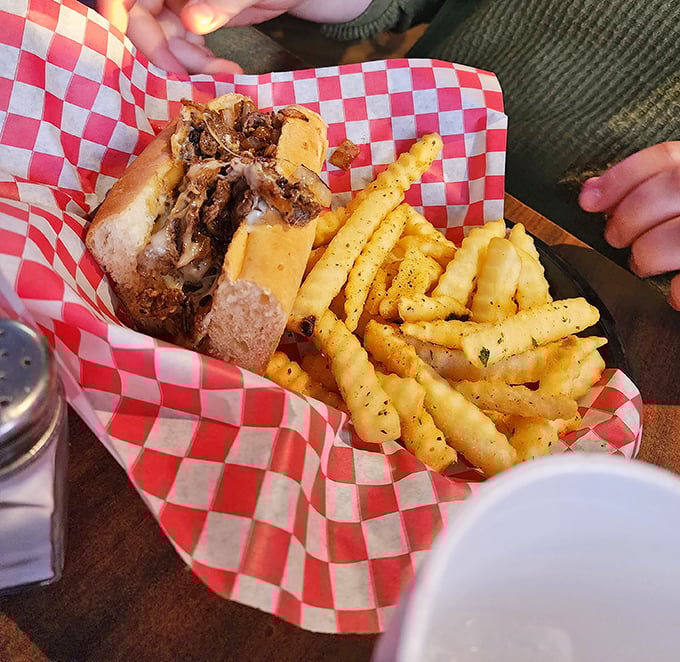 When a sandwich requires this much commitment, you know you're in the right place. The melty cheese is practically winking at you.