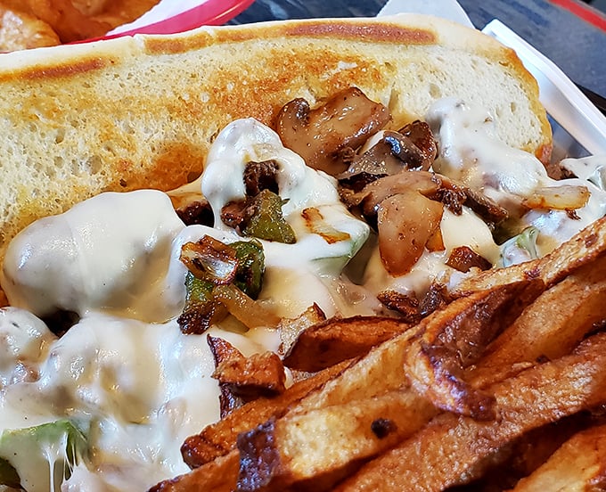 Melted cheese cascades over tender steak and veggies in this Philly sandwich that would make Rocky himself climb those steps for a second round.