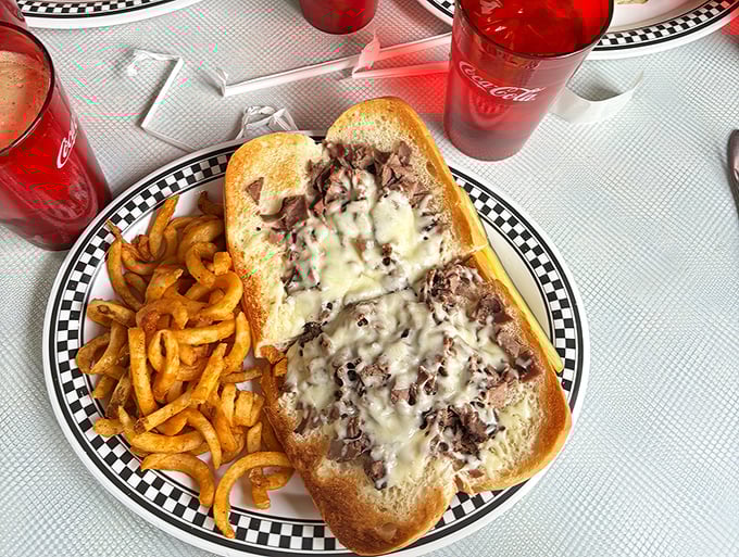 This isn't just a Philly cheesesteak—it's a masterclass in melted perfection. The cheese-to-meat ratio would make Rocky himself climb those steps again.