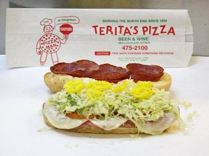 The pizza sub—where two Italian-American classics collide in delicious harmony. Those banana peppers add the perfect zingy counterpoint to the rich meats.