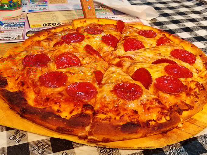 This pepperoni pizza isn't trying to reinvent the wheel—it's just perfecting it with a crust that walks the line between crispy and chewy.
