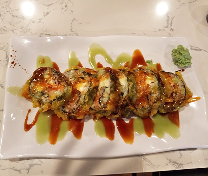 These aren't your average sushi rolls—they're flavor bombs dressed for a night out. Sauces dance across the plate like culinary choreography.