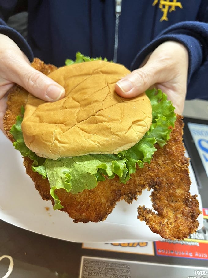 This pork chop sandwich is what happens when Southern comfort food meets handheld convenience—crispy, juicy, and requiring both hands and several napkins.