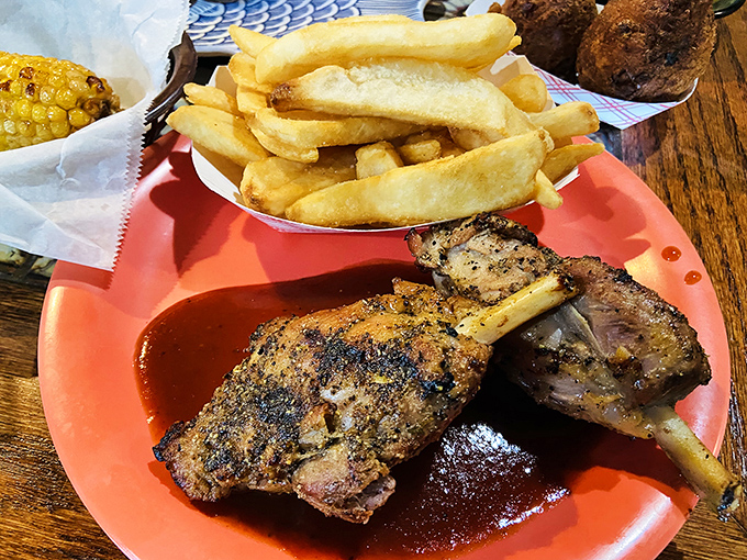 Pork shanks with fries that would make Fred Flintstone do a double-take—prehistoric-sized portions with modern flavor that's worth every napkin.